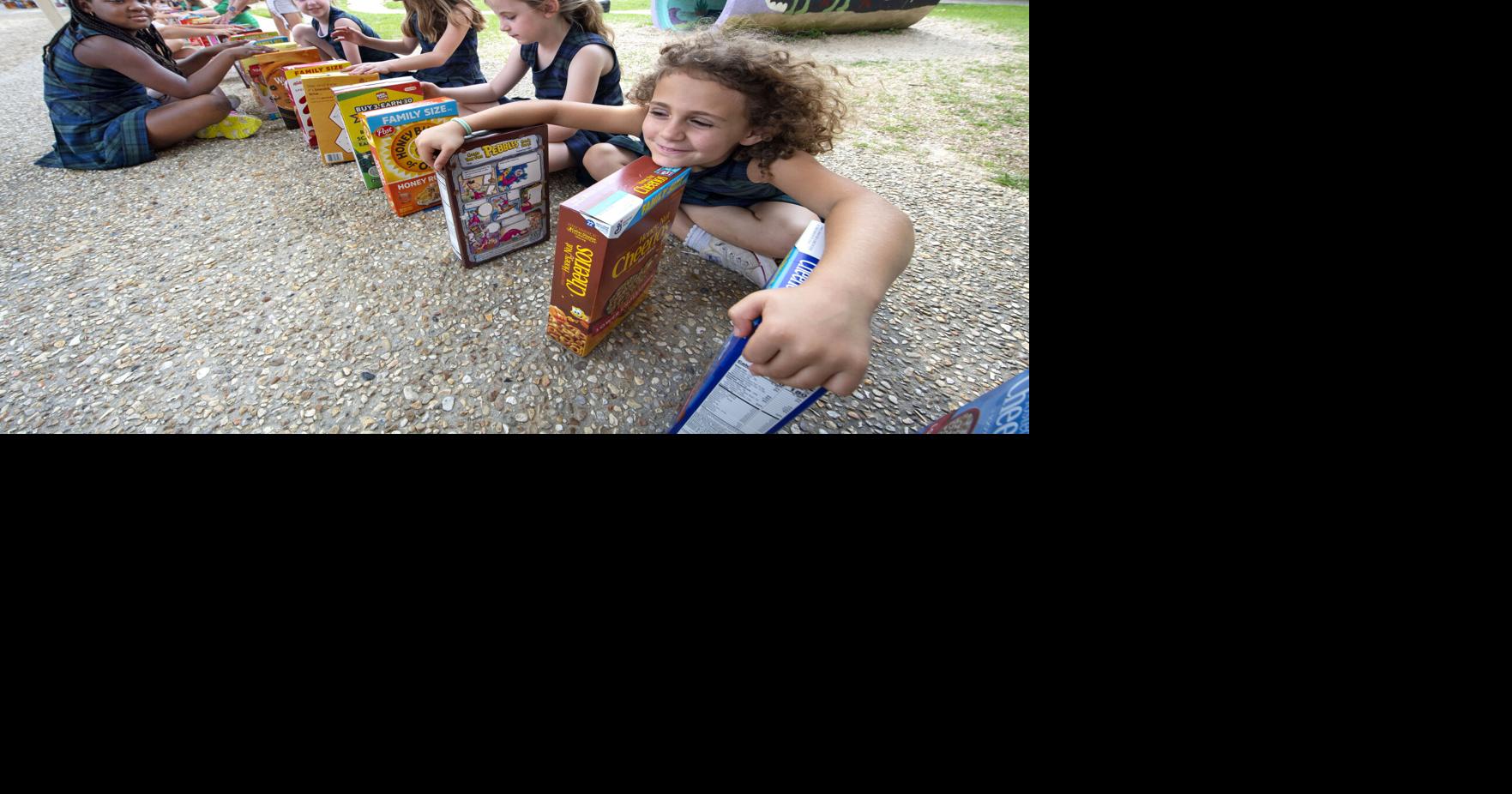 Cereal box domino chain event help Baton Rouge Food Bank | Photos ...