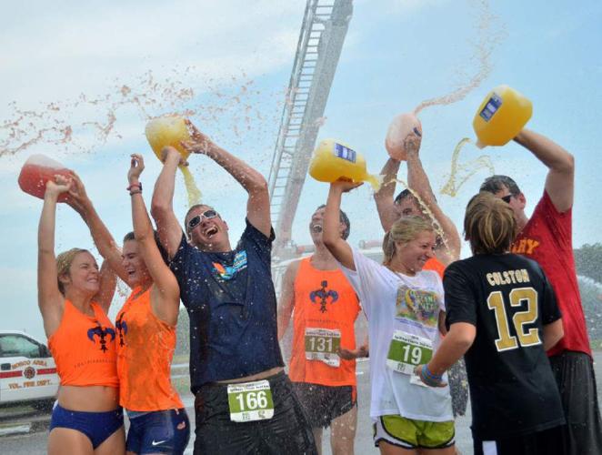 Runners slog through fun, challenging Great Spillway Classic Trail Run ...