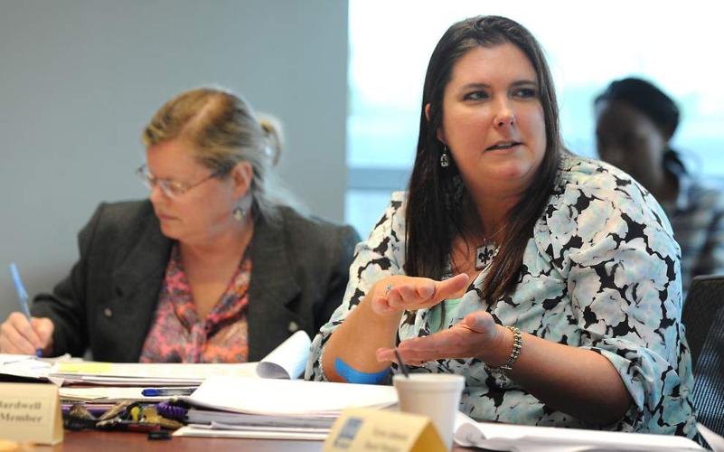 Library Board members consider lowering tax in face of push by some ...