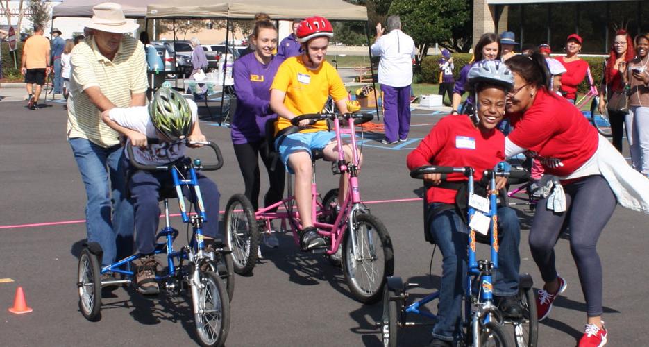 Children with disabilities get ready to race at ninth annual Kids Bike ...