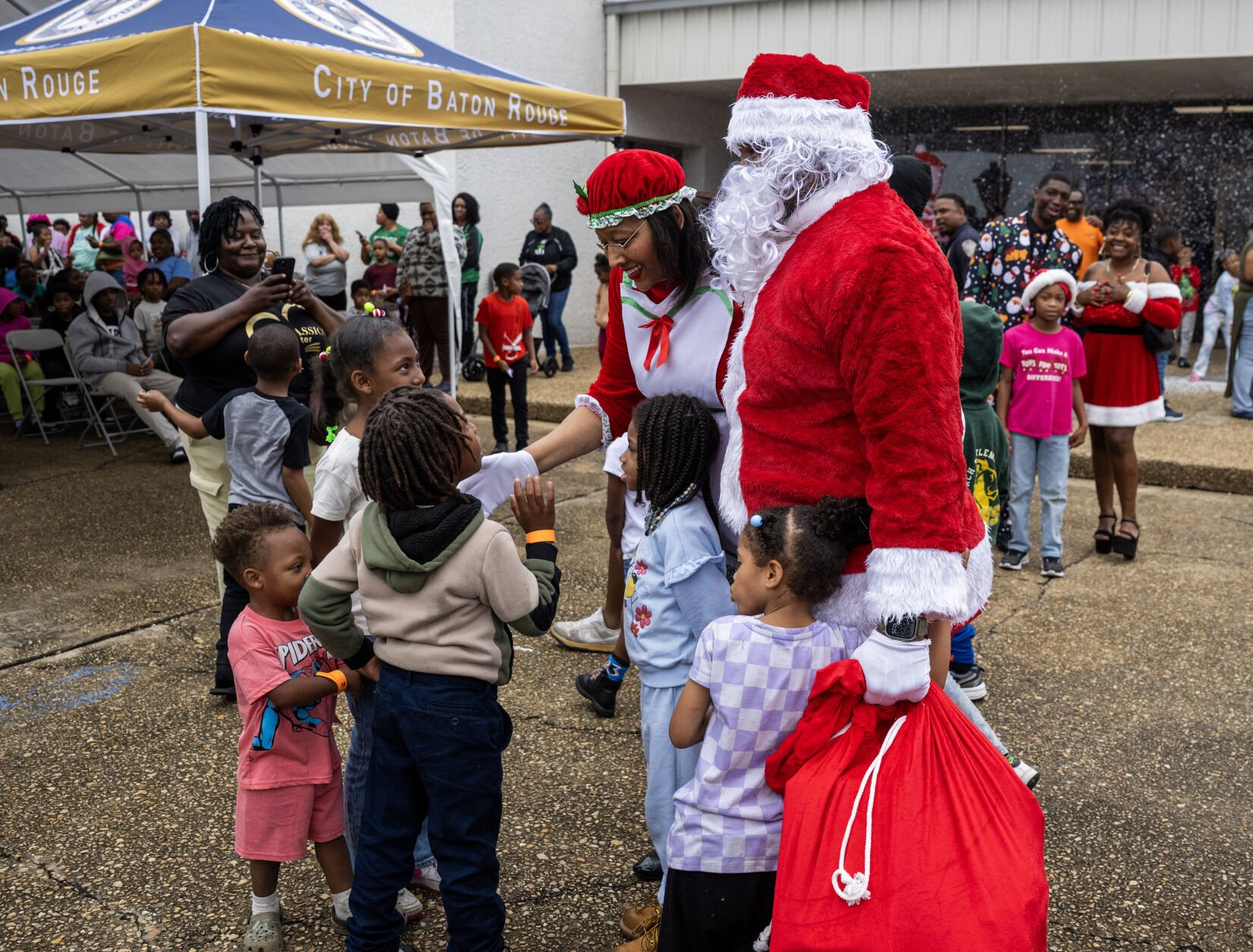 Photos: Children receive the joy of Christmas with annual Baton Rouge ...