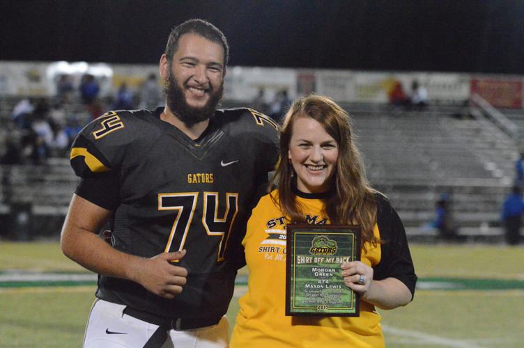 St. Amant High football players present awards to faculty, staff for ...