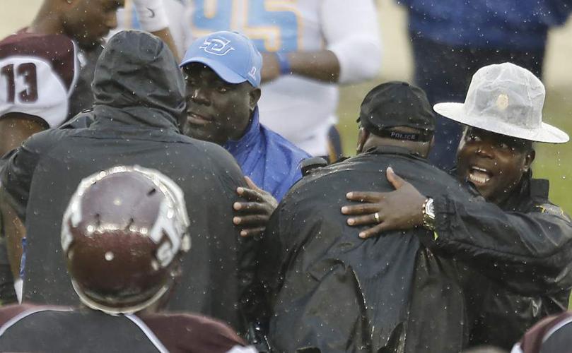Photos: Southern sloshes its way to messy, but important, win at Texas ...