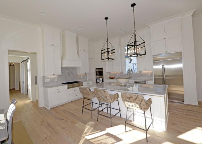 Ryan and Britt Bowker build their home around a courtyard with a play ...