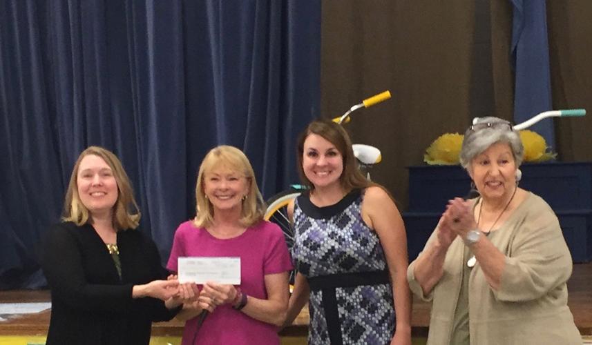 Baton Rouge FLAIM's Run Club ends year with check from mini marathon ...