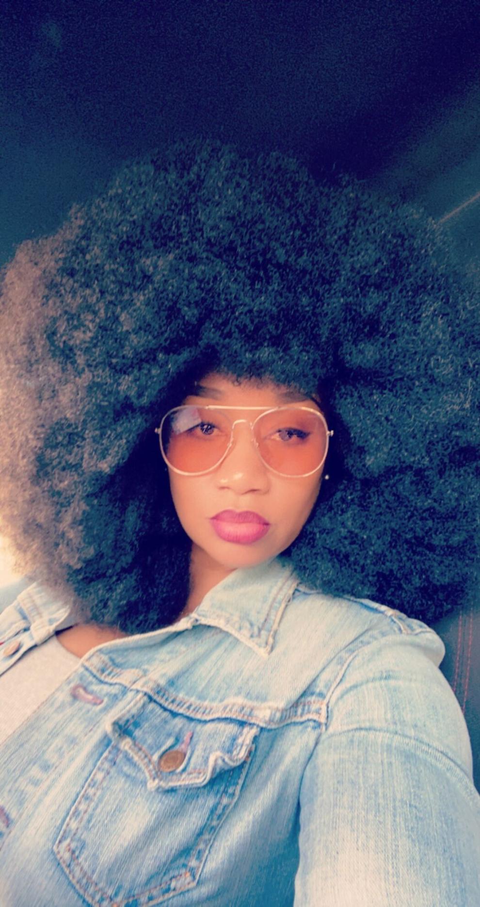 Louisiana woman sets Guinness world record for biggest afro ...