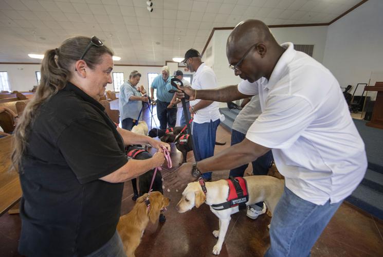 In Angola, inmates train dogs to help vets with PTSD: 'A builder ...