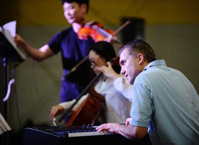 Photos: Composer Eric Genuis performs and speaks at Truman Early ...