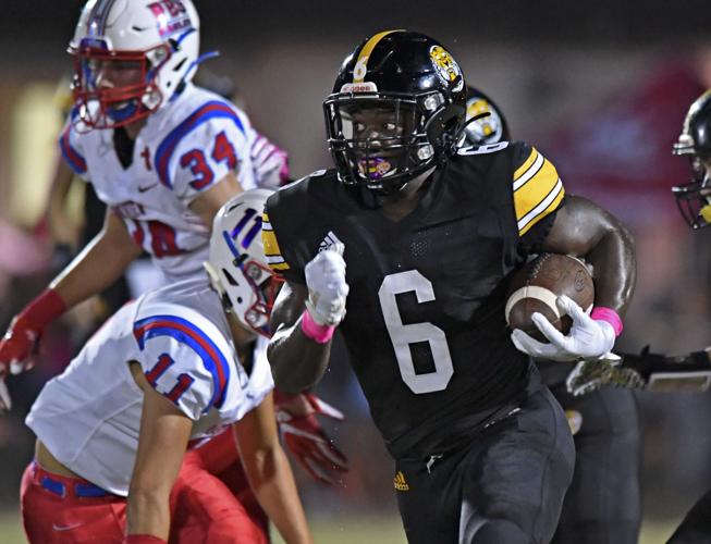 QB Tanner Lawson uses arm, legs to help U-High oust Parkview 34-20 ...
