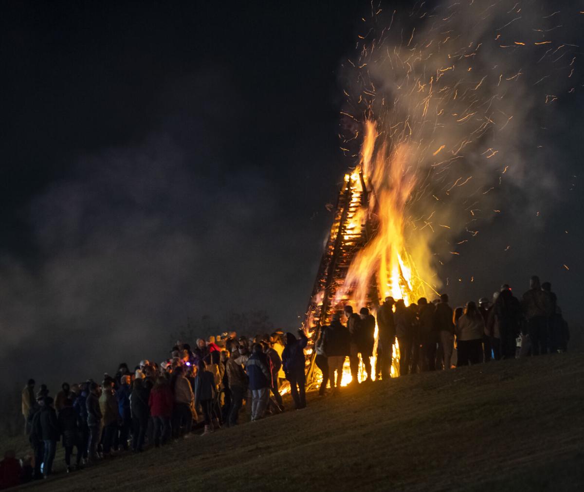 Photos: Christmas Eve Bonfires light the way for Papa Noel | Baton ...