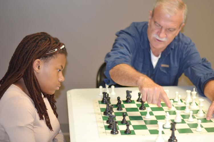 Chess coach unlocks board adventures, gets better in process | Zachary ...