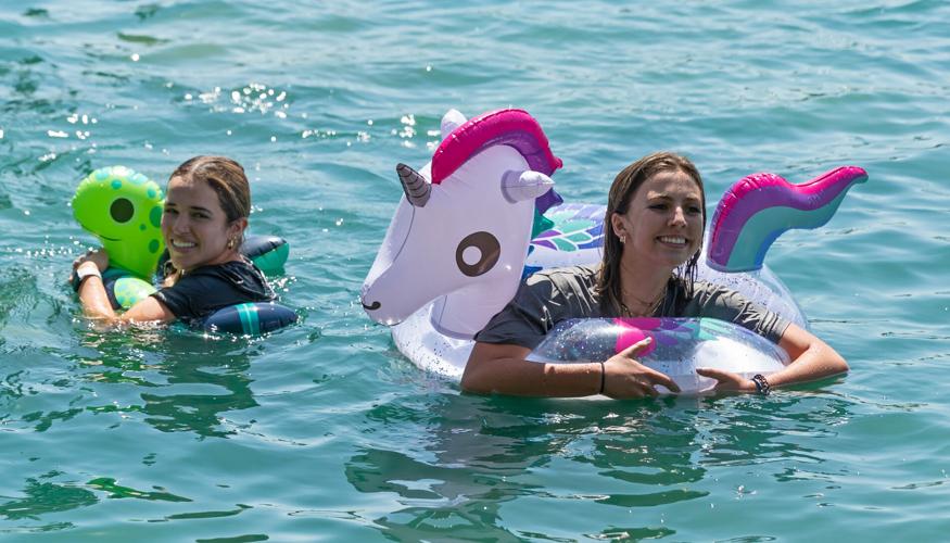 EA seniors finish final exams and take the plunge in annual pond jump ...