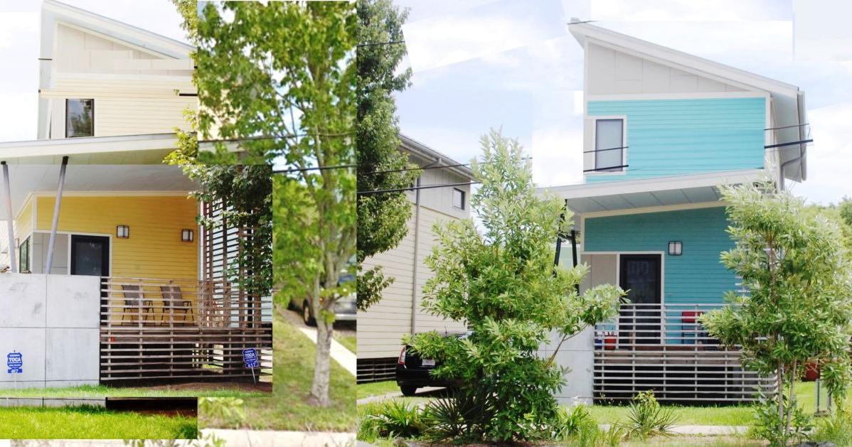 A row of modern homes in Holy Cross, where levee is a front-row seat to ...