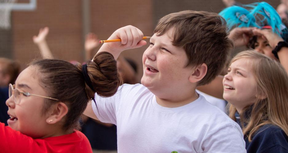 2 STEM teachers fly over schools as cheering students wave from below ...