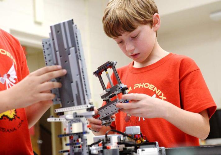 Six middle school science-savvy kids to bring their robot to First Lego ...
