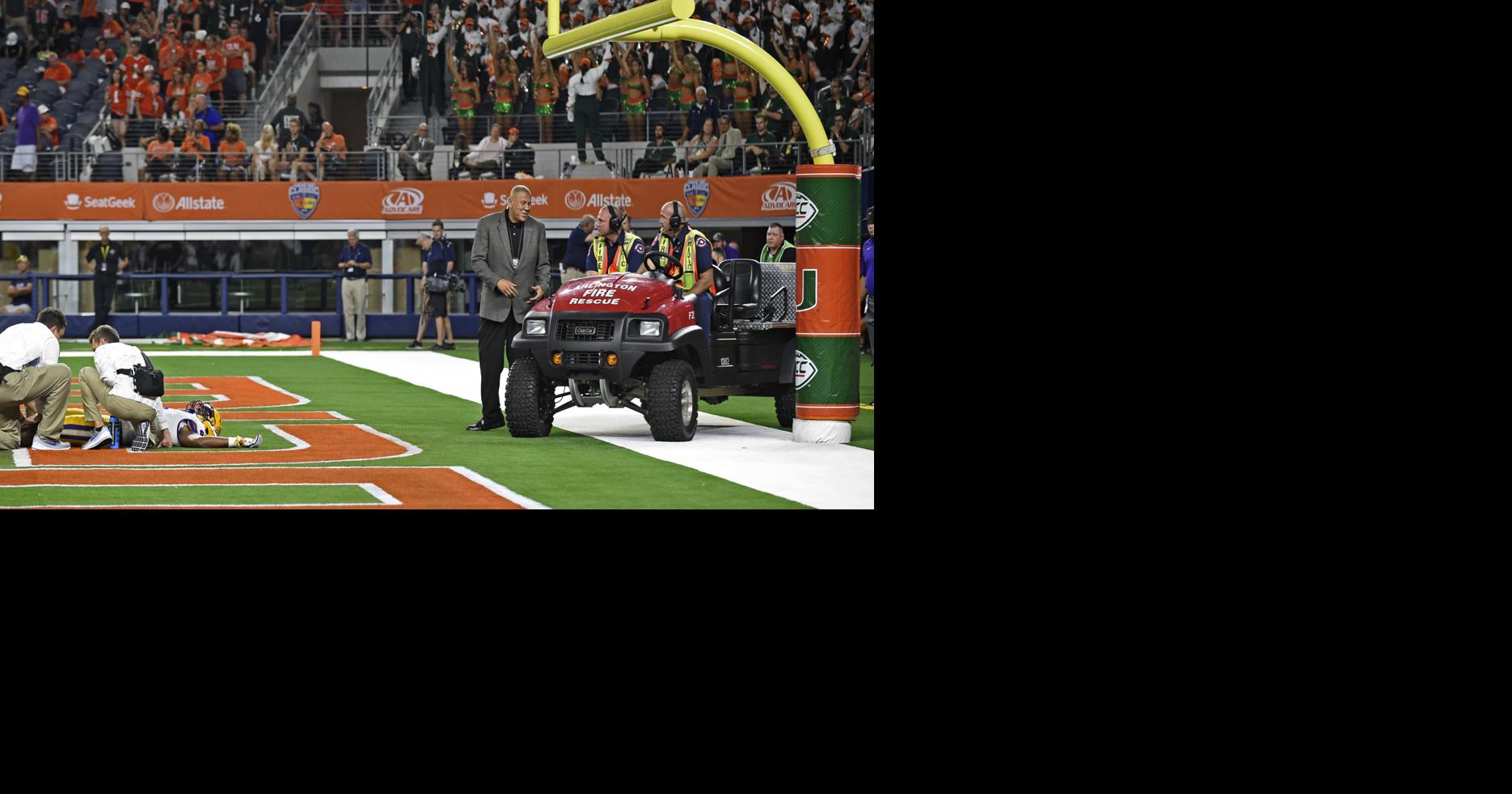 LSU's K'Lavon Chaisson, Adrian Magee leave Miami game injured; Orgeron ...