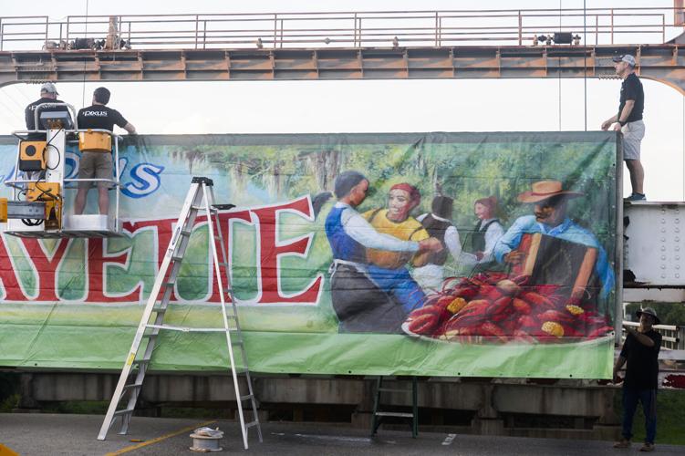 Iconic Robert Dafford murals installed on historic Pinhook Bridge in ...