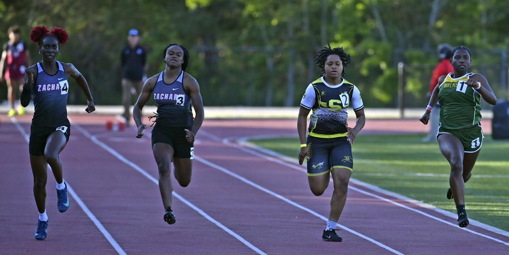 The art of flight; Zachary athletes show their high-flying abilities at ...