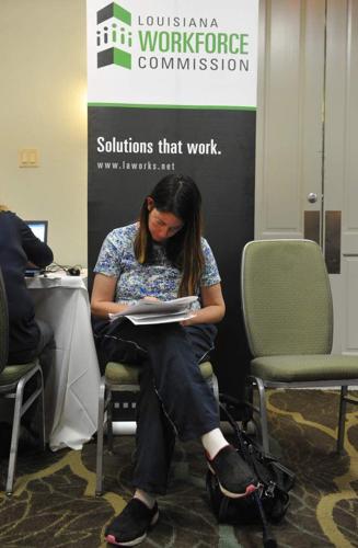 Hundreds crowd Lafayette hotel to interview for jobs at Ambassador Town ...