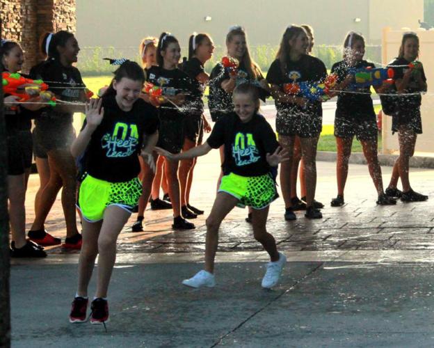 Live Oak High, Middle cheerleaders attend summer event at LSU ...