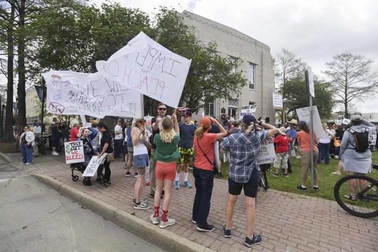 200 rally in Lafayette to protest Trump policies, cuts | News ...