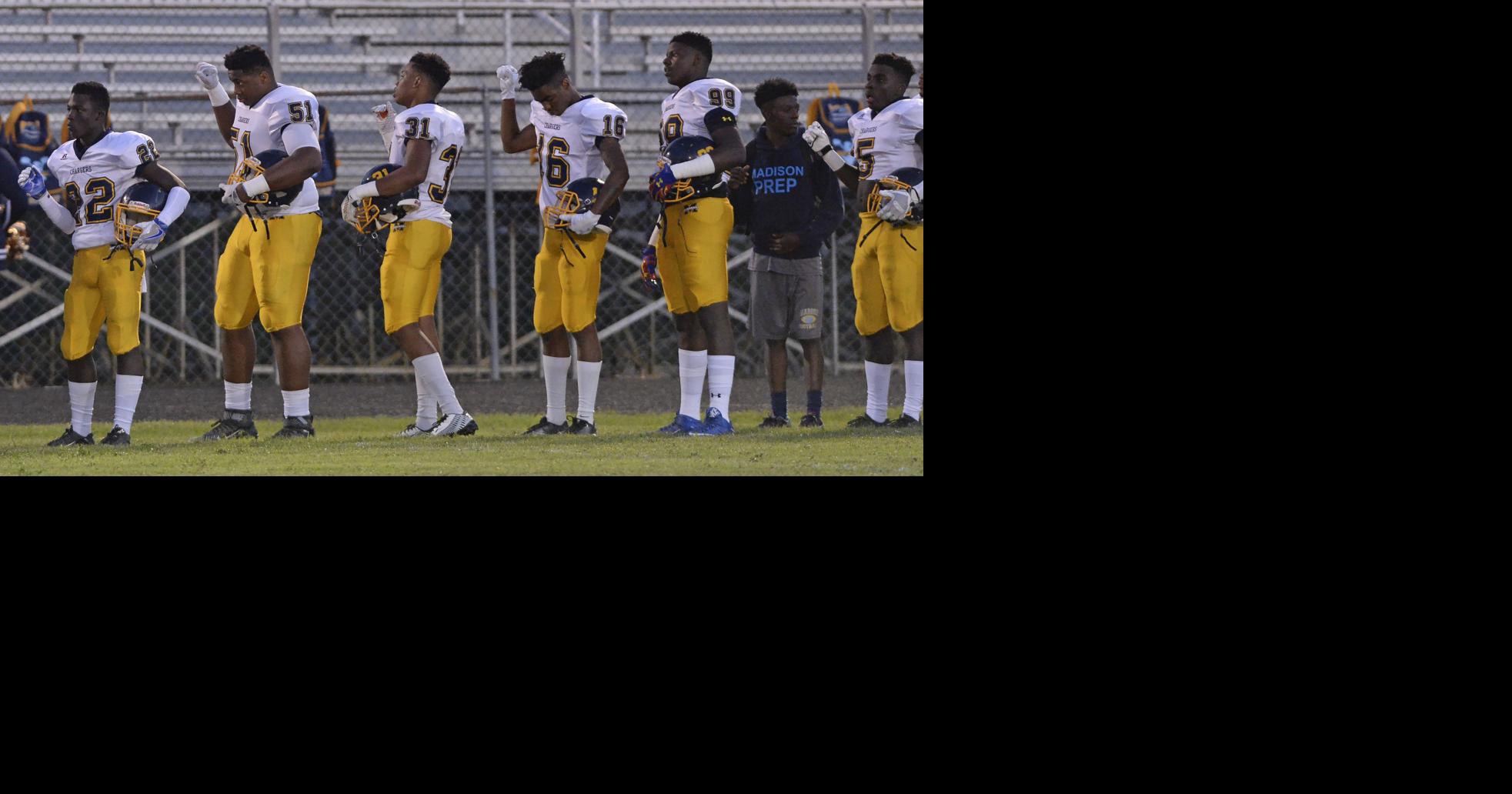 Bonnabel player kneels, several Madison Prep players raise fists during ...