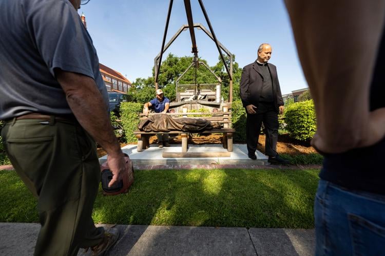 Homeless Jesus sculpture installed at St. John Cathedral | News ...