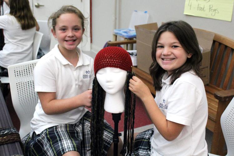 Academy of the Sacred Heart students make soft yarn wigs for children ...