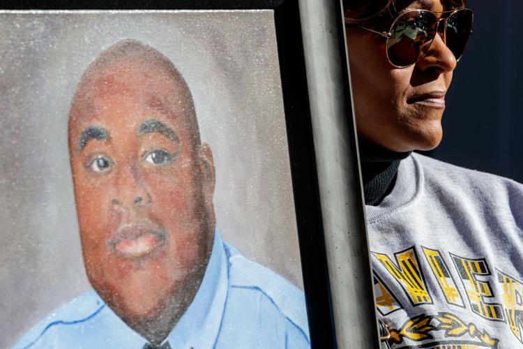 Photos: Family of Marcus McNeil receives his portrait | Photos ...
