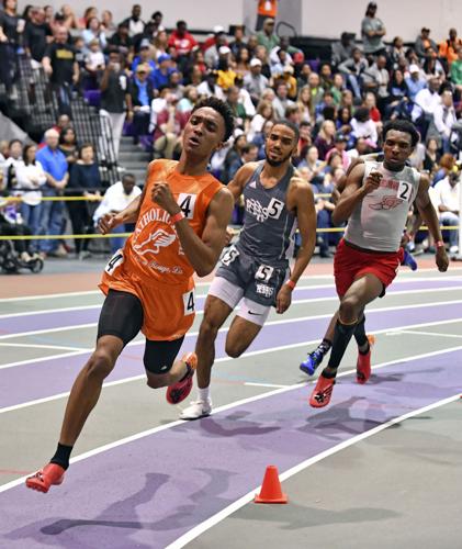 Soaring and scoring: Zachary's Chris Hilton clears 7-0 in high jump ...