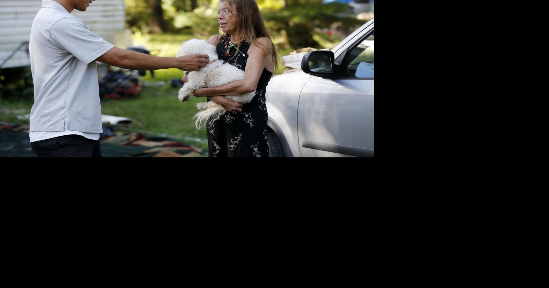 Video: Men behind daring rescue of woman, dog during Baton Rouge ...