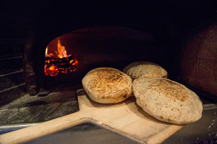 Chef Alon Shaya extends a Chanukah dinner to lend a hand across the ...
