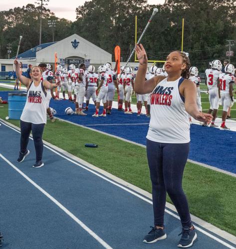 Fans, cheerleaders, twirlers, dancers add to excitement of middle ...