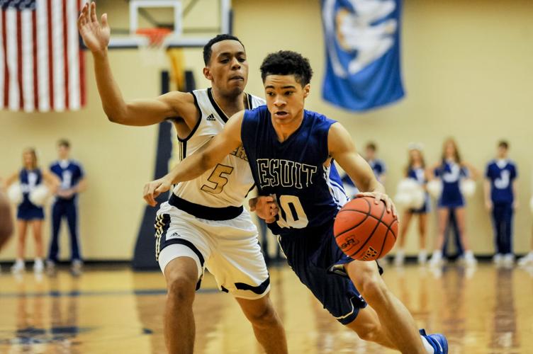 Led by Elijah Morgan's 31 points, Jesuit stuns Holy Cross | High ...
