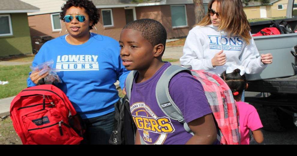 Lowery staff surprises elementary students with backpacks, holiday ...