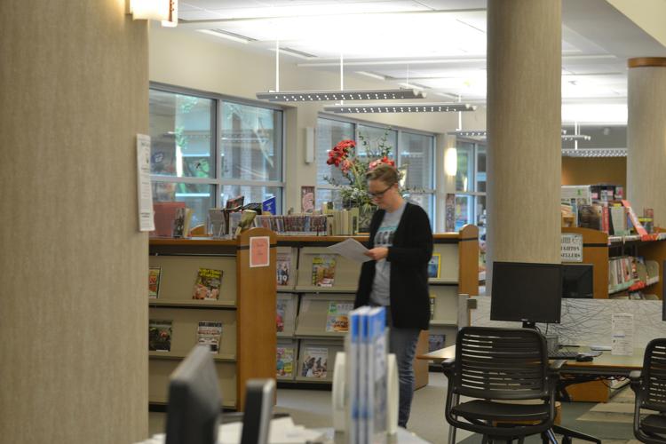 New branch manager also a fan, patron of the library | Zachary ...