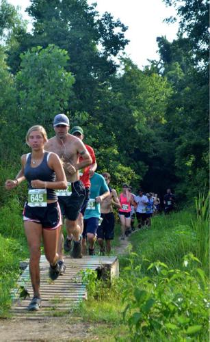 Runners slog through fun, challenging Great Spillway Classic Trail Run ...