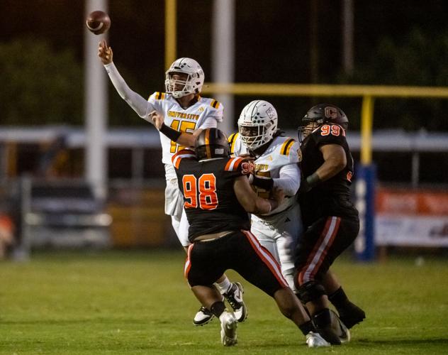 University makes statement with big win over Catholic | High School ...