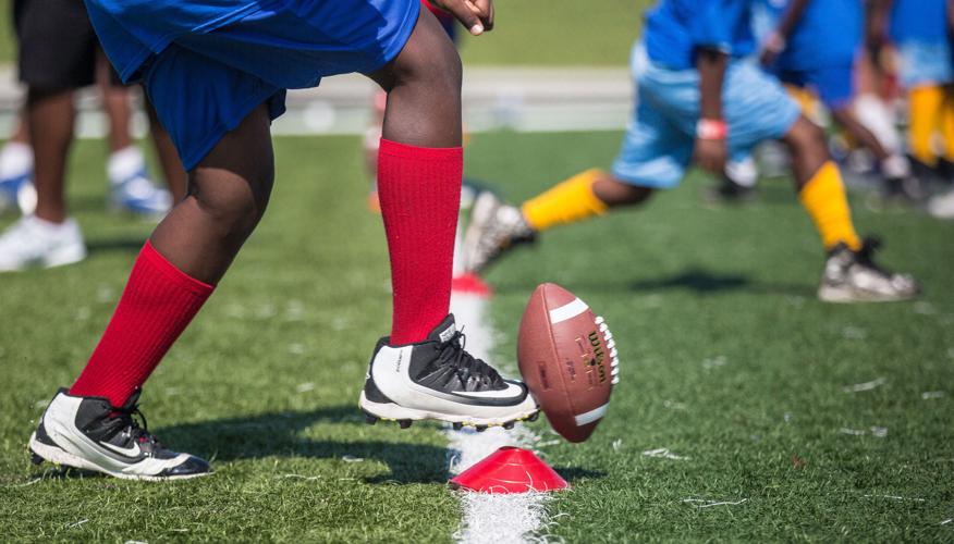 Photos: New Orleans youth learn to punt, pass, kick and cheer at free ...