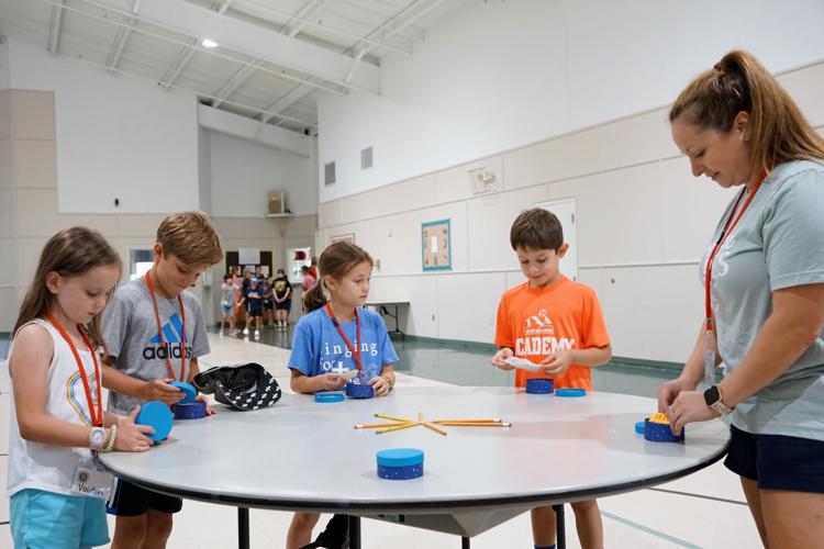 Children take a faith expedition during Vacation Bible School at Plains ...