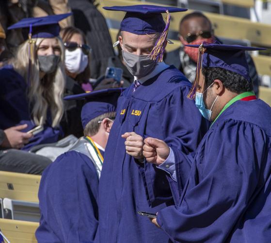 Despite the cold, and coronavirus, LSU graduates 1,966 at outdoor ...