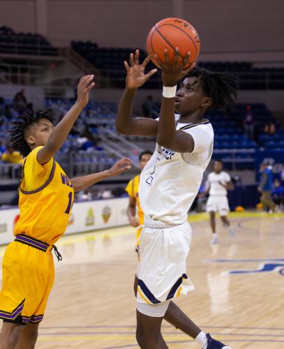 And again: MVP Dez'mond Perkins helps lead Madison Prep by Wossman in ...