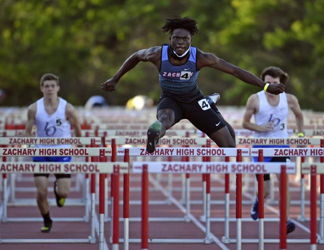 The art of flight; Zachary athletes show their high-flying abilities at ...