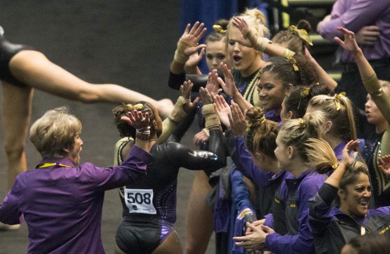 Video: CBS News on LSU’s Lloimincia Hall, not your ‘typical’ gymnast ...