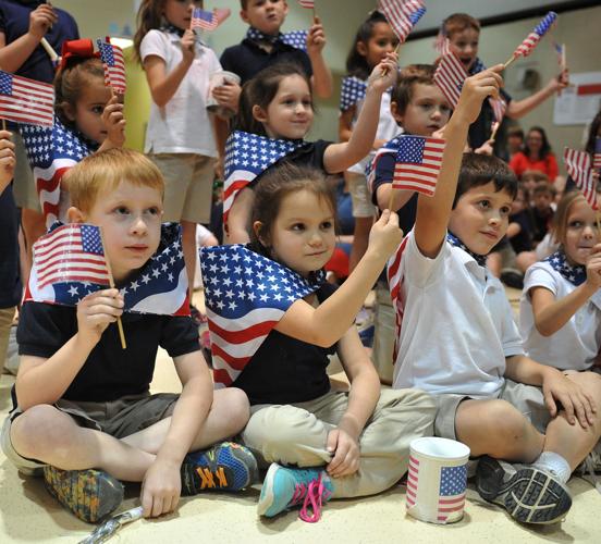 Seventh Ward students honor veterans with song, flags and speeches ...