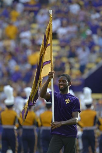 Believed to be first, Morgan City man dances, twirls flag with LSU ...