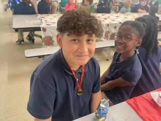 Slaughter Elementary programs celebrates hard work with holiday party ...