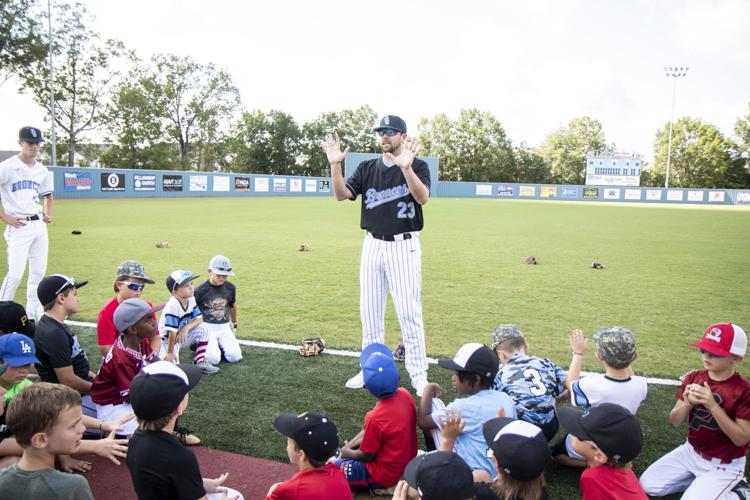 Play ball. Young players pick up tips at summer youth baseball camp ...