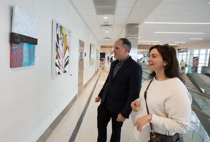Bare no more! Basin Arts decks walls of Lafayette Regional Airport with ...