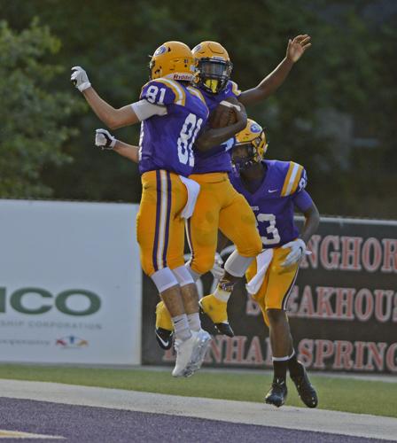 An emotional victory: In its football opener after August's devastating ...